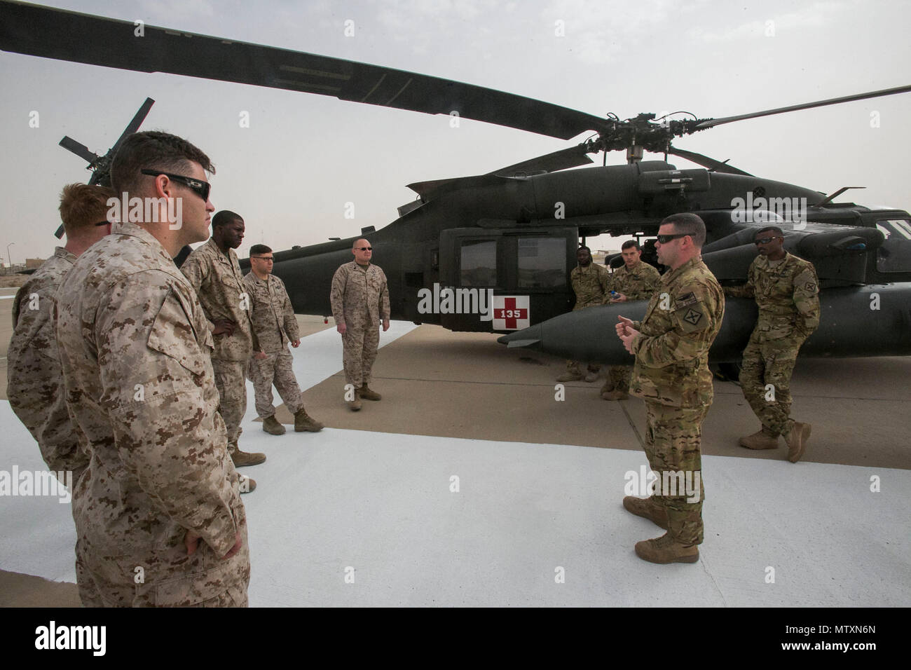 U.S. Army Chief Warrant Officer Kevin Connolly, an HH-60M Black Hawk ...