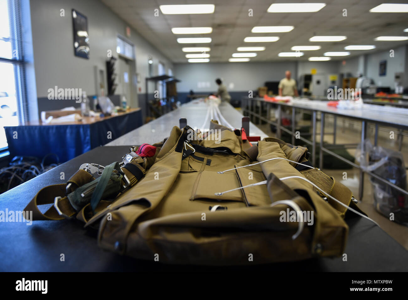 The low-profile parachute is configured for use in AC-130 gunships ...