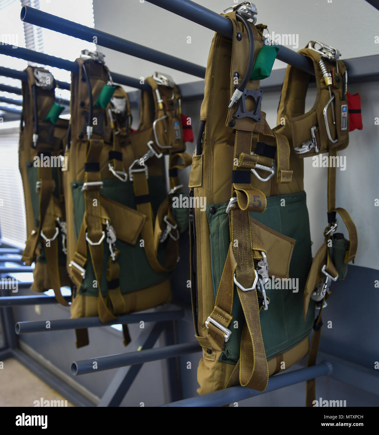 The low-profile parachute is configured for use in AC-130 gunships ...