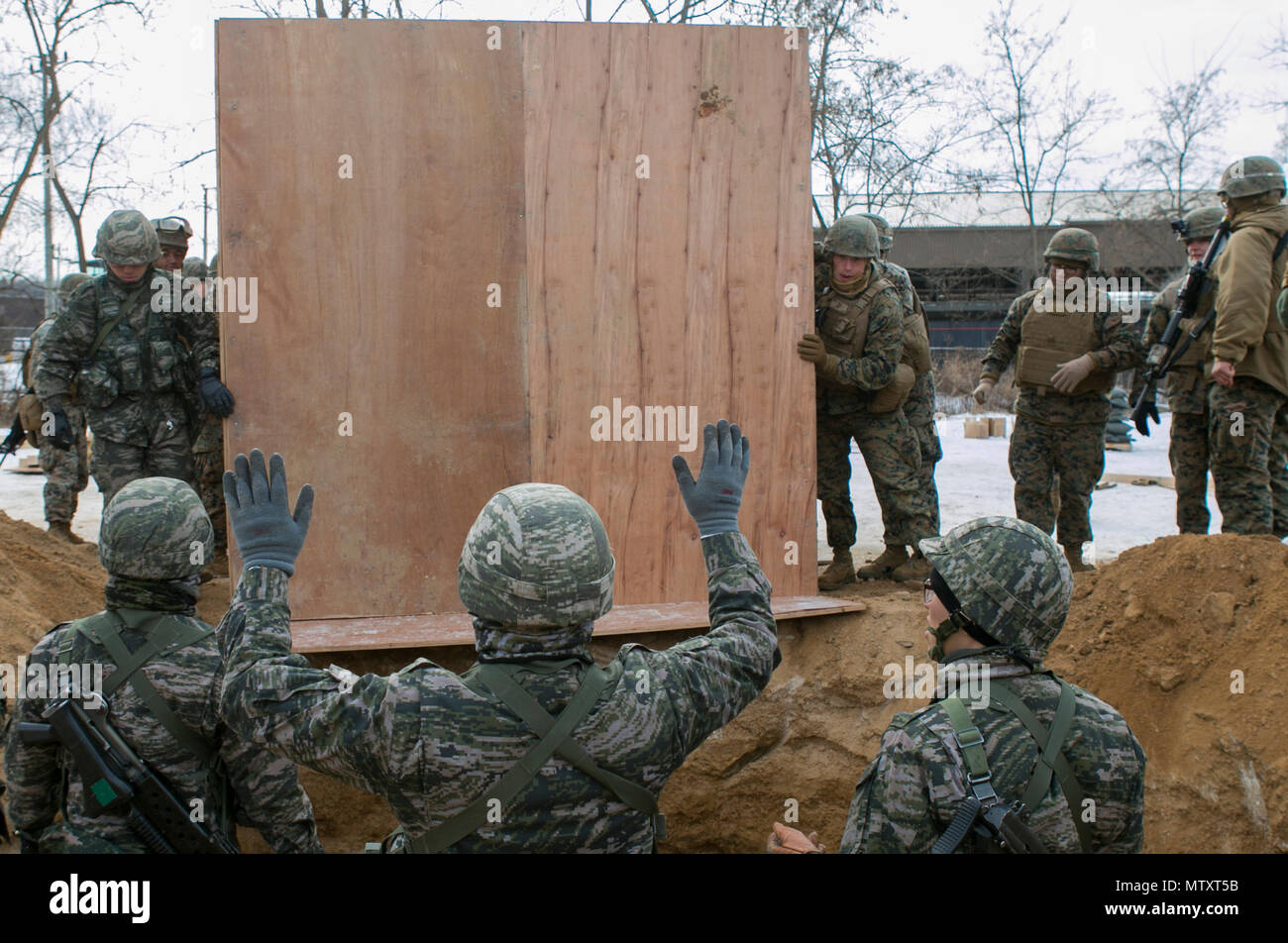 U.S. Marines, with Alpha Company, 9th Engineer Support Battalion, 3rd ...