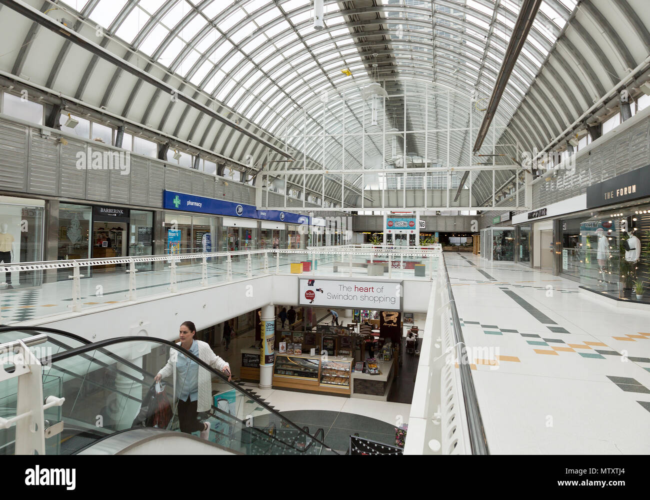 Almost empty quiet inside shopping mall, Brunel Centre, Swindon ...