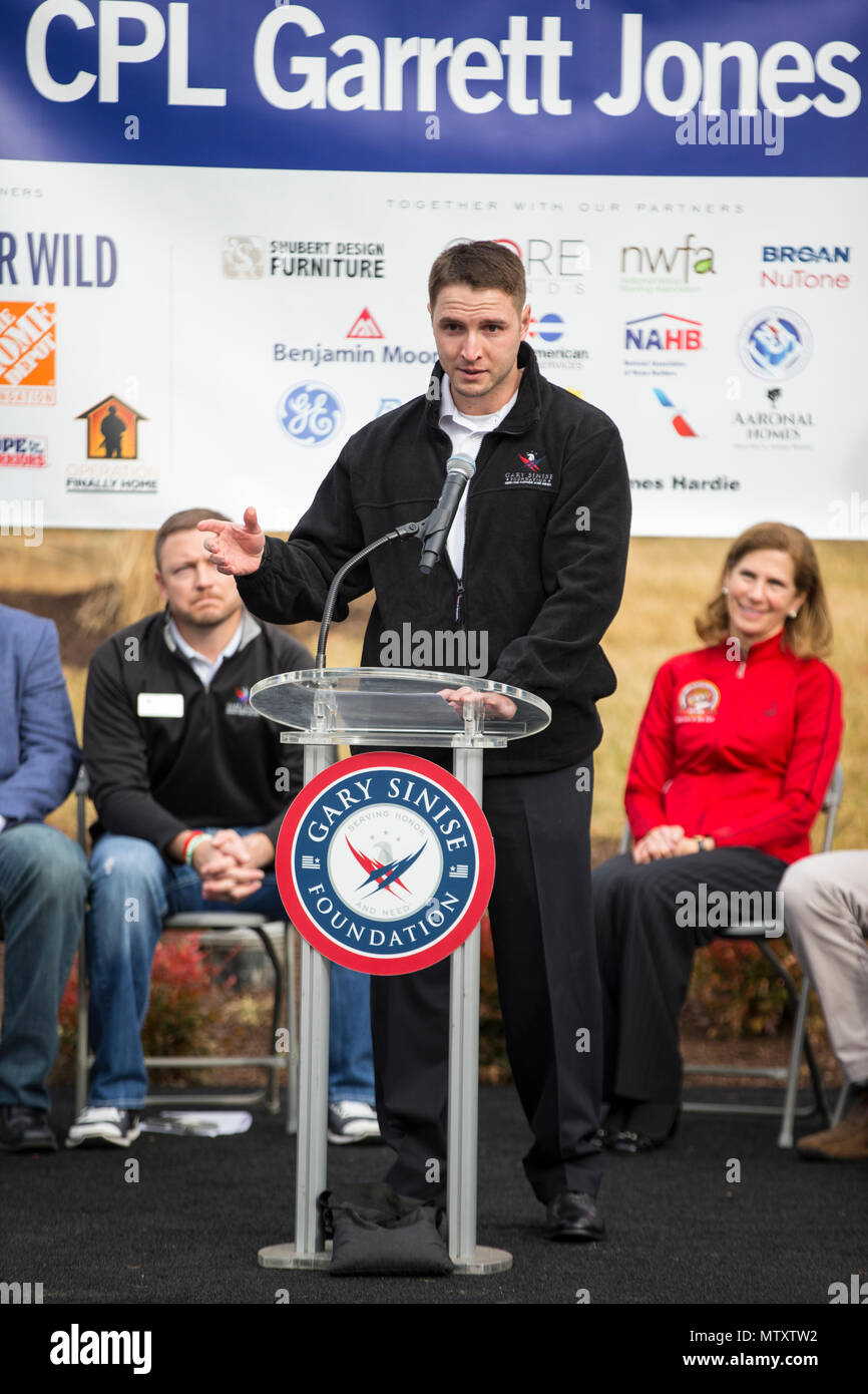 Retired U.S. Marine Corps Cpl. Garrett Jones speaks during the Smart ...