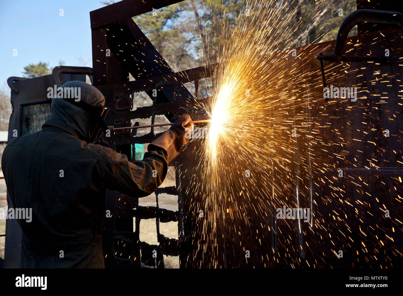 U.S. Marines attending the Methods of Entry (MOE) course, learn to use ...