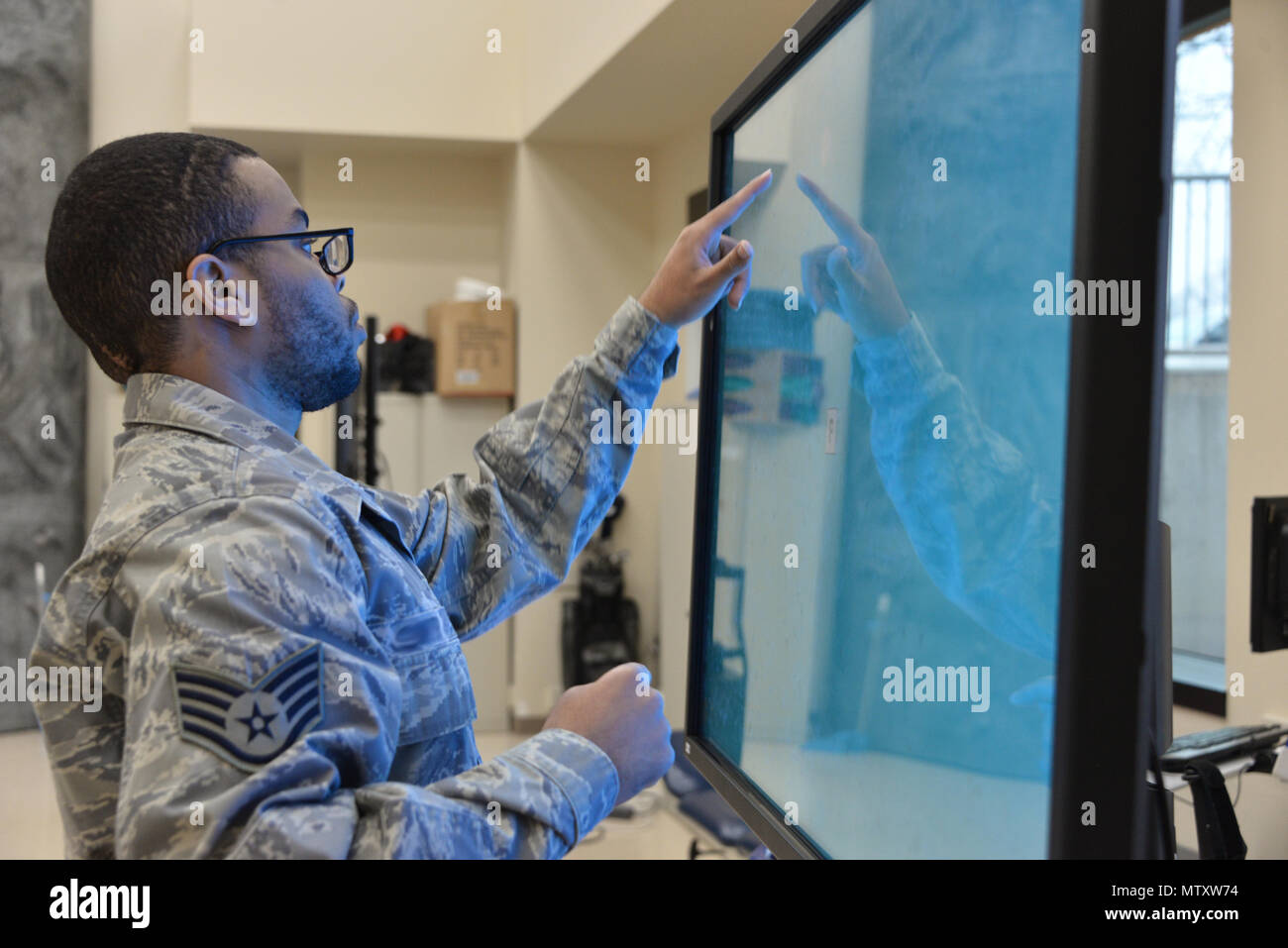 Staff Sgt. Rasheed, 7th Intelligence Squadron, selects a letter ...