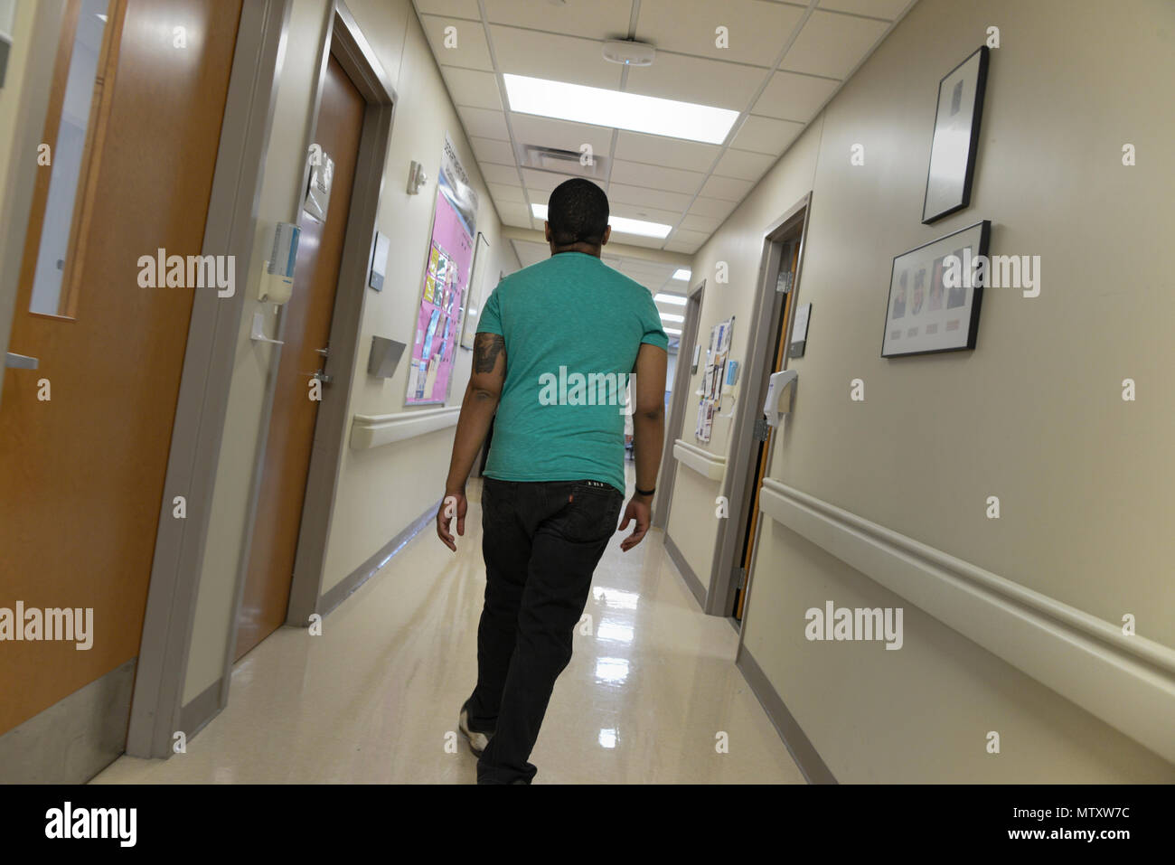 Staff Sgt. Rasheed, 7th Intelligence Squadron, walks the hallways of ...