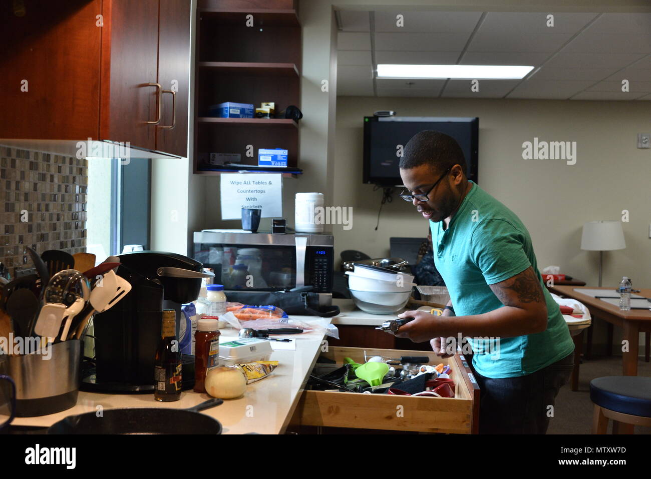 Staff Sgt. Rasheed, 7th Intelligence Squadron, consolidates a list of ...