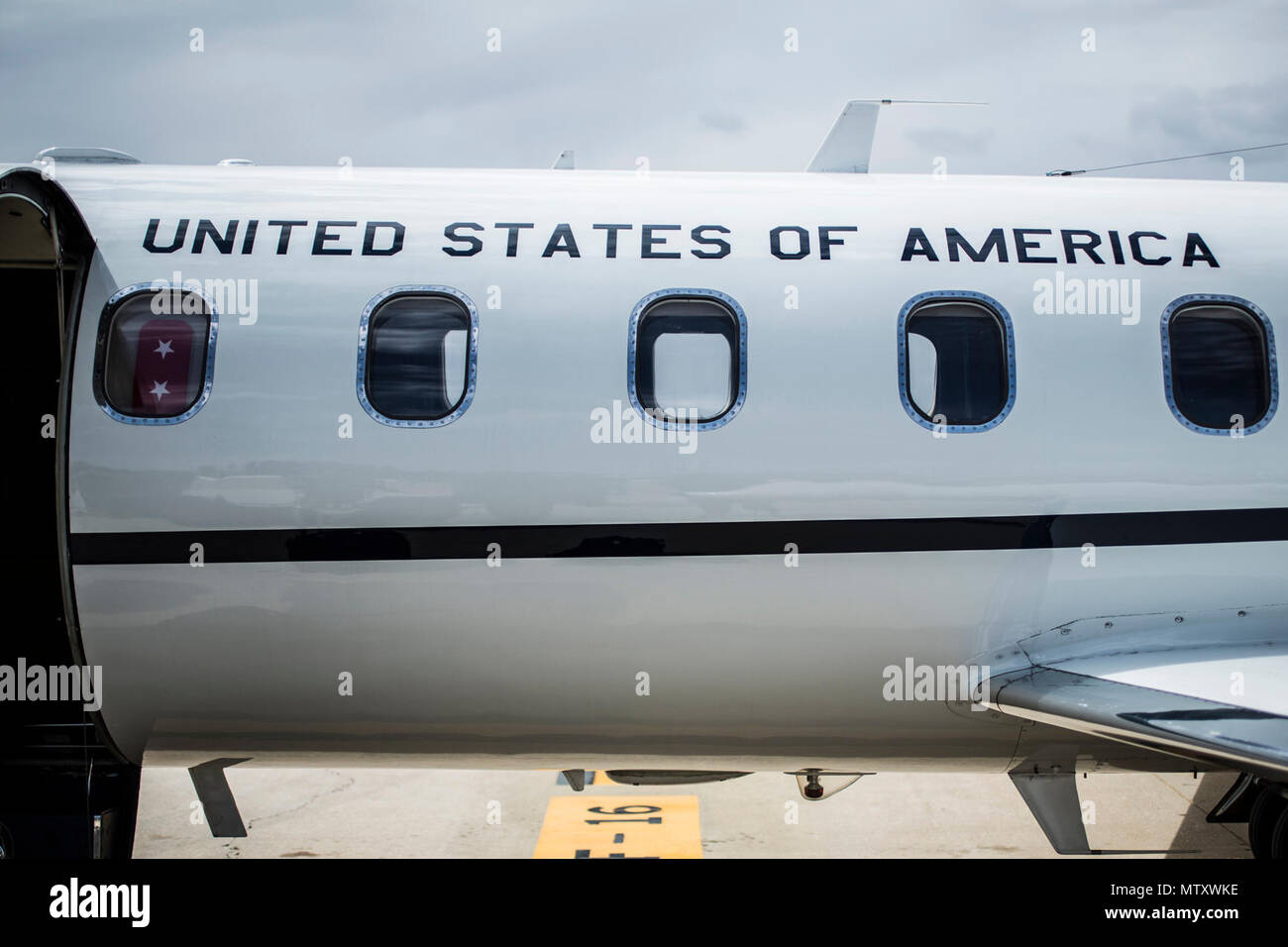 A C-21A aircraft is parked on the flight line at Morón Air Base, Spain ...