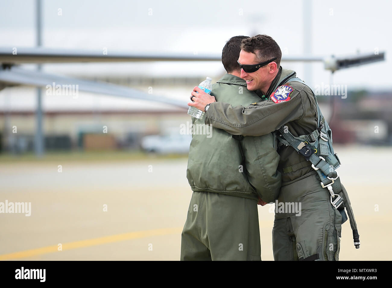 From left, U.S. Air Force Maj. Daniel Dickinson, F-22 Raptor ...
