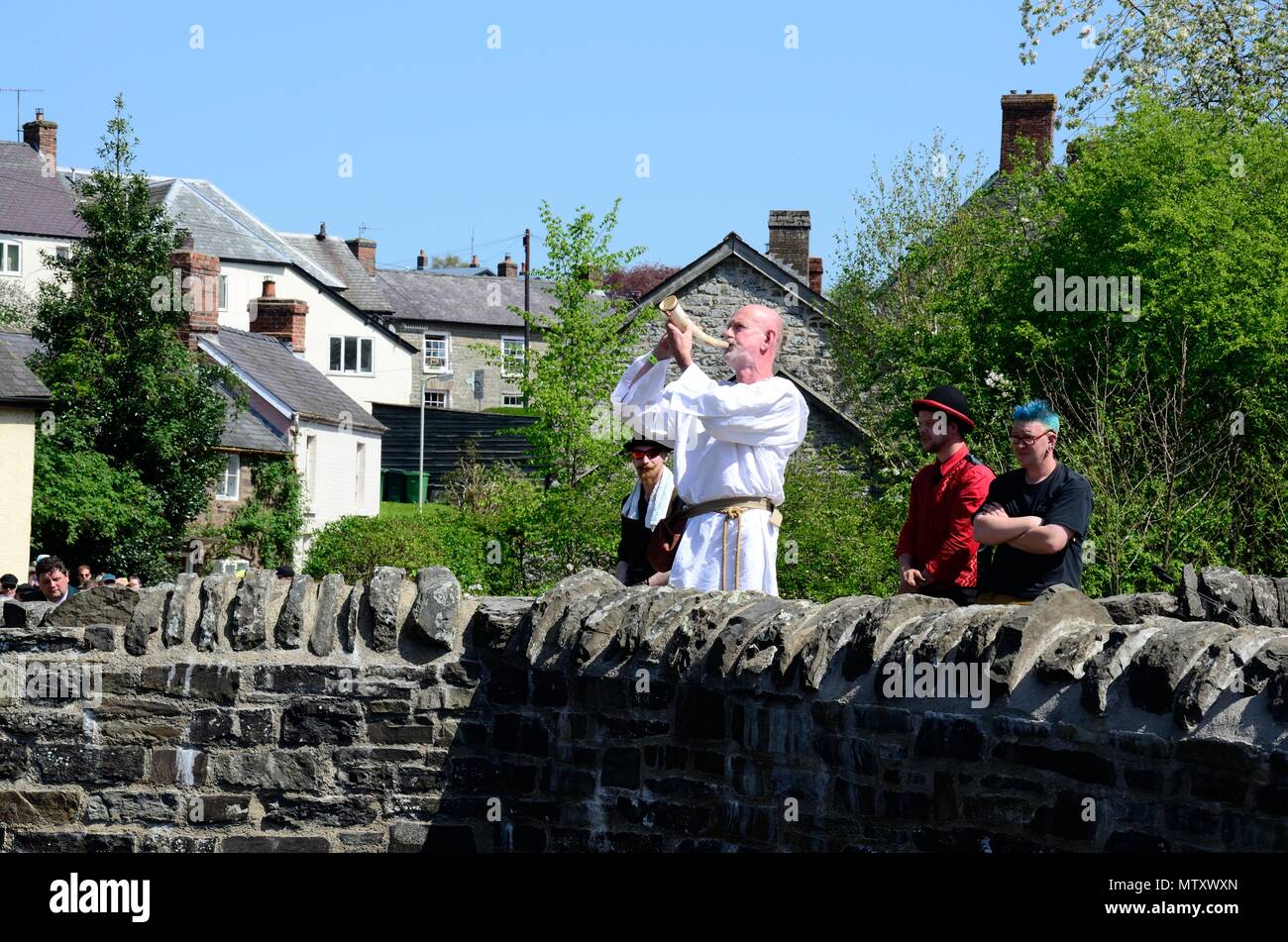 A pagan blessing on Clun Medieval bridge at the start of Clun Green man ...