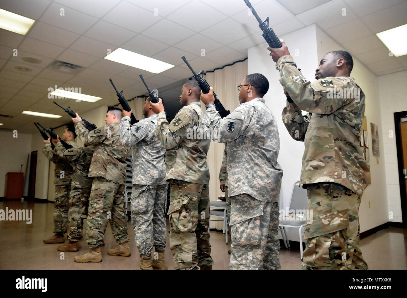 U.S. Army Reserve Soldiers, Staff Sgt. Ariel DeLeon, left, and Sgt. 1st ...