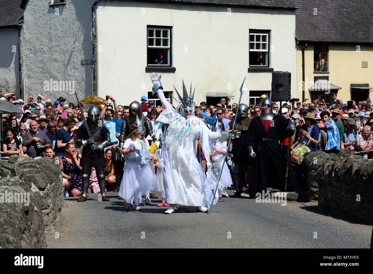 the Ice Queen on Clun medieval bridge in a battle to hold on to winter ...