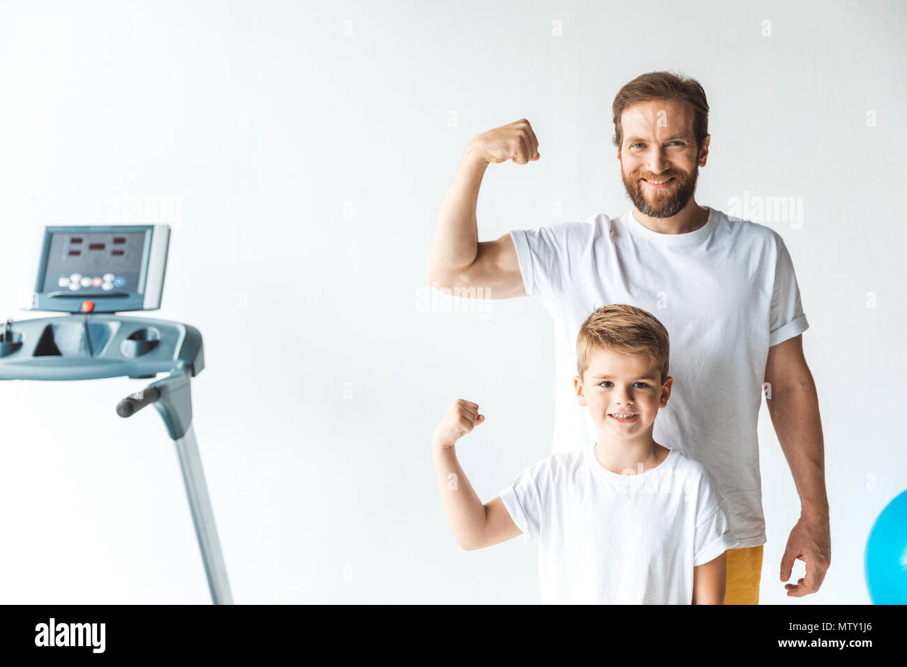 Father Son Showing Muscles High Resolution Stock Photography and Images ...