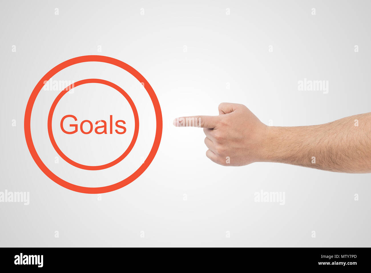 Businessman's hand showing on drawn goal on whiteboard Stock Photo - Alamy