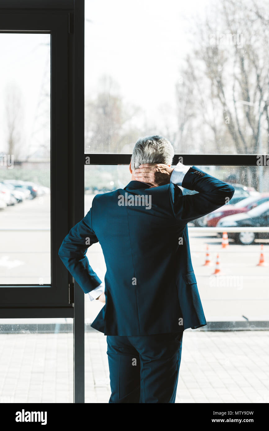 Back view senior businessman hi-res stock photography and images - Alamy