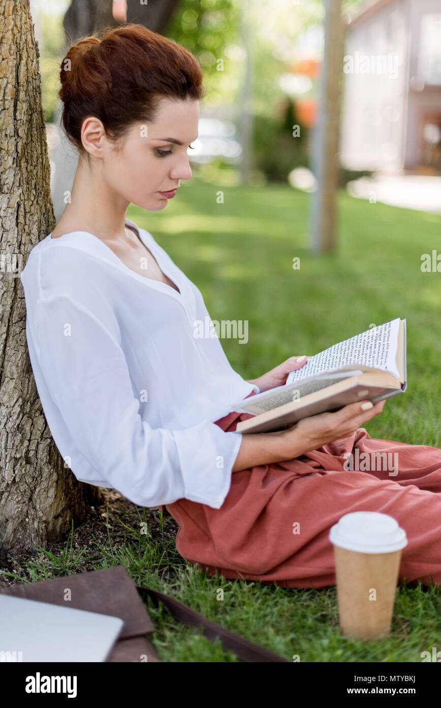 Young woman leaning back hi-res stock photography and images - Alamy