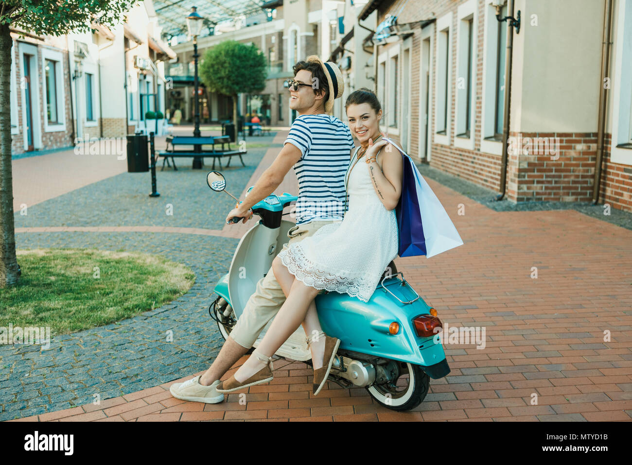 Lady on moped hi-res stock photography and images - Alamy