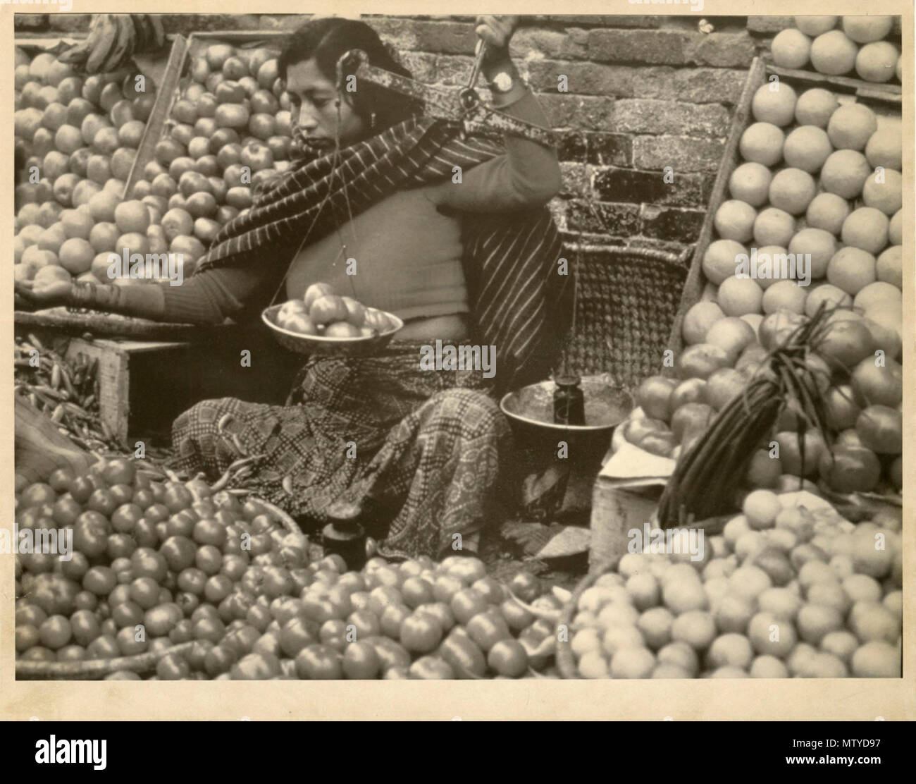 woman weighing fruit Stock Photo - Alamy