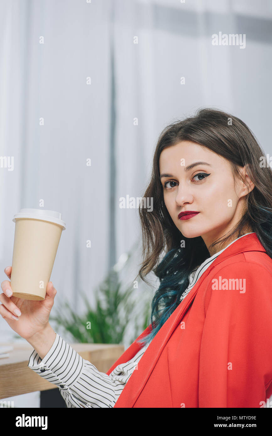 Lady holding coffee hi-res stock photography and images - Alamy