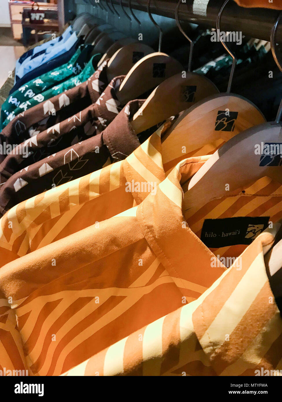 08 May 2018, US, Hawaii, Hilo: Hawaiian shirts hang in the shop of ...