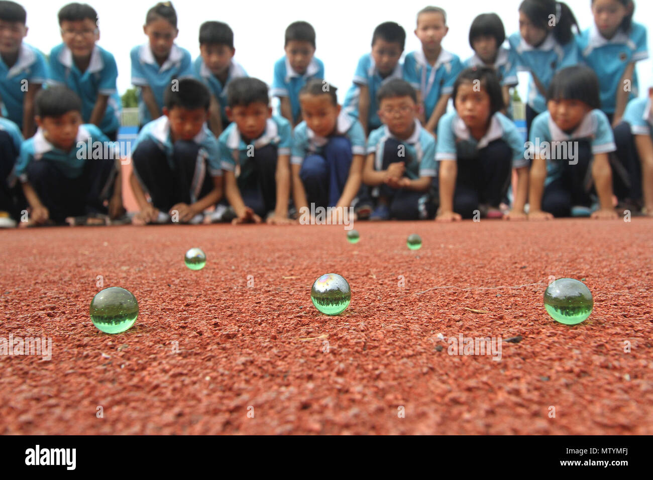 Play marbles hi-res stock photography and images - Alamy