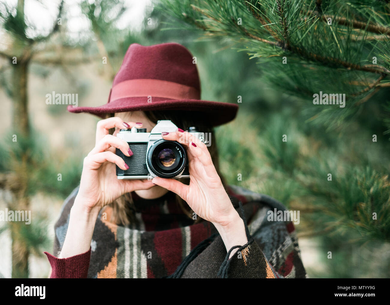 Woman photographing retro camera hi-res stock photography and images ...