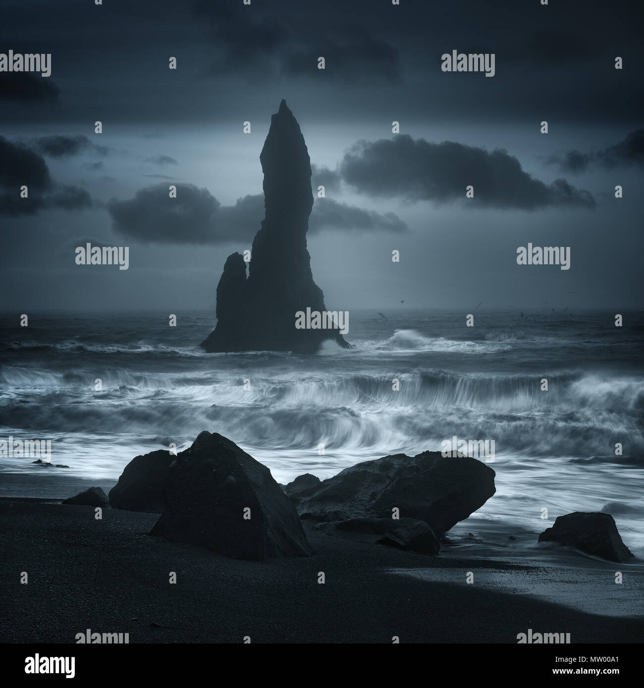 Reynisdrangur sea stacks off Black Sand Beach, Reynisfjara, Iceland ...