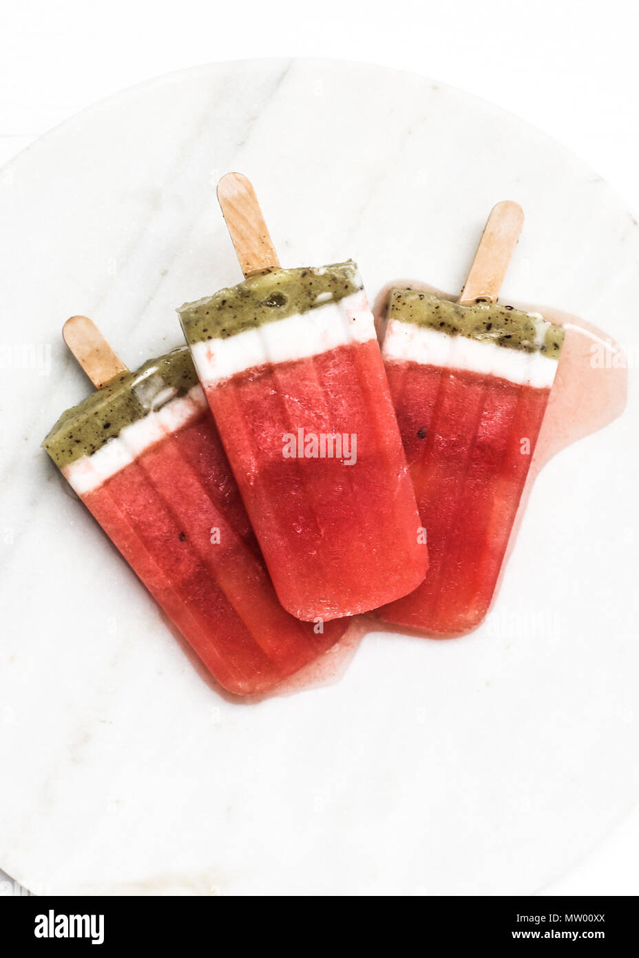 Melting ice lolly eating hi-res stock photography and images - Alamy