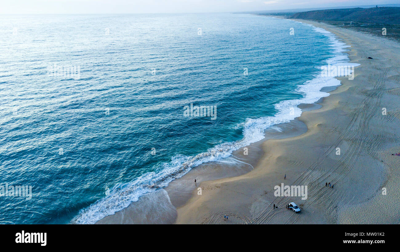 Aerial view of people and cars on the beach, Punta Lobos beach, Todos ...