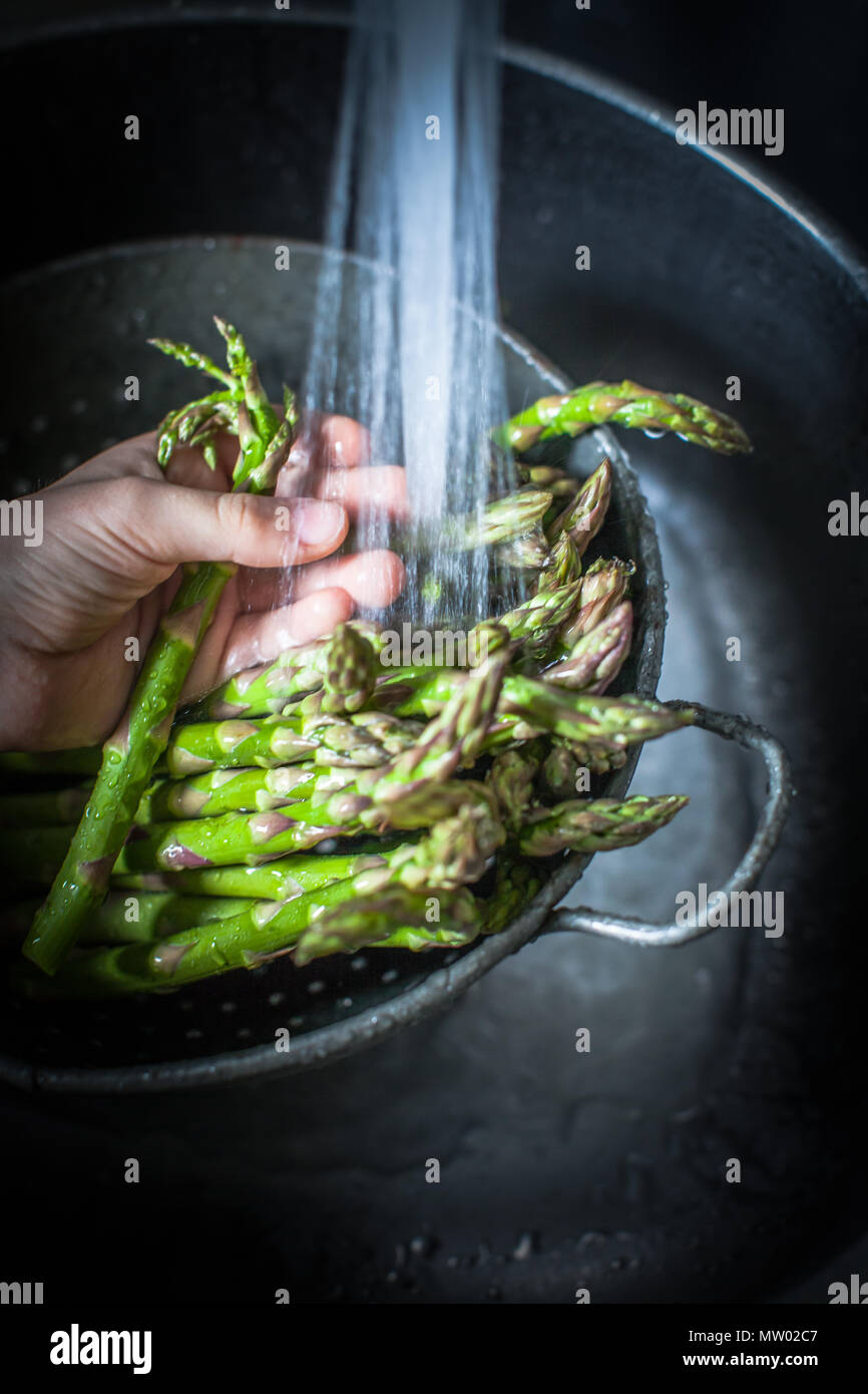 Mans hand washing in sink hi-res stock photography and images - Alamy