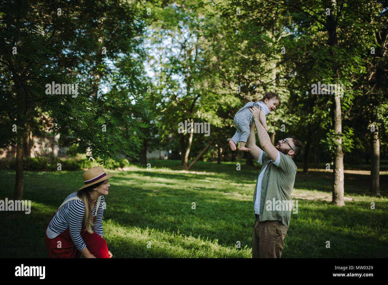 Three adults one child hi-res stock photography and images - Alamy