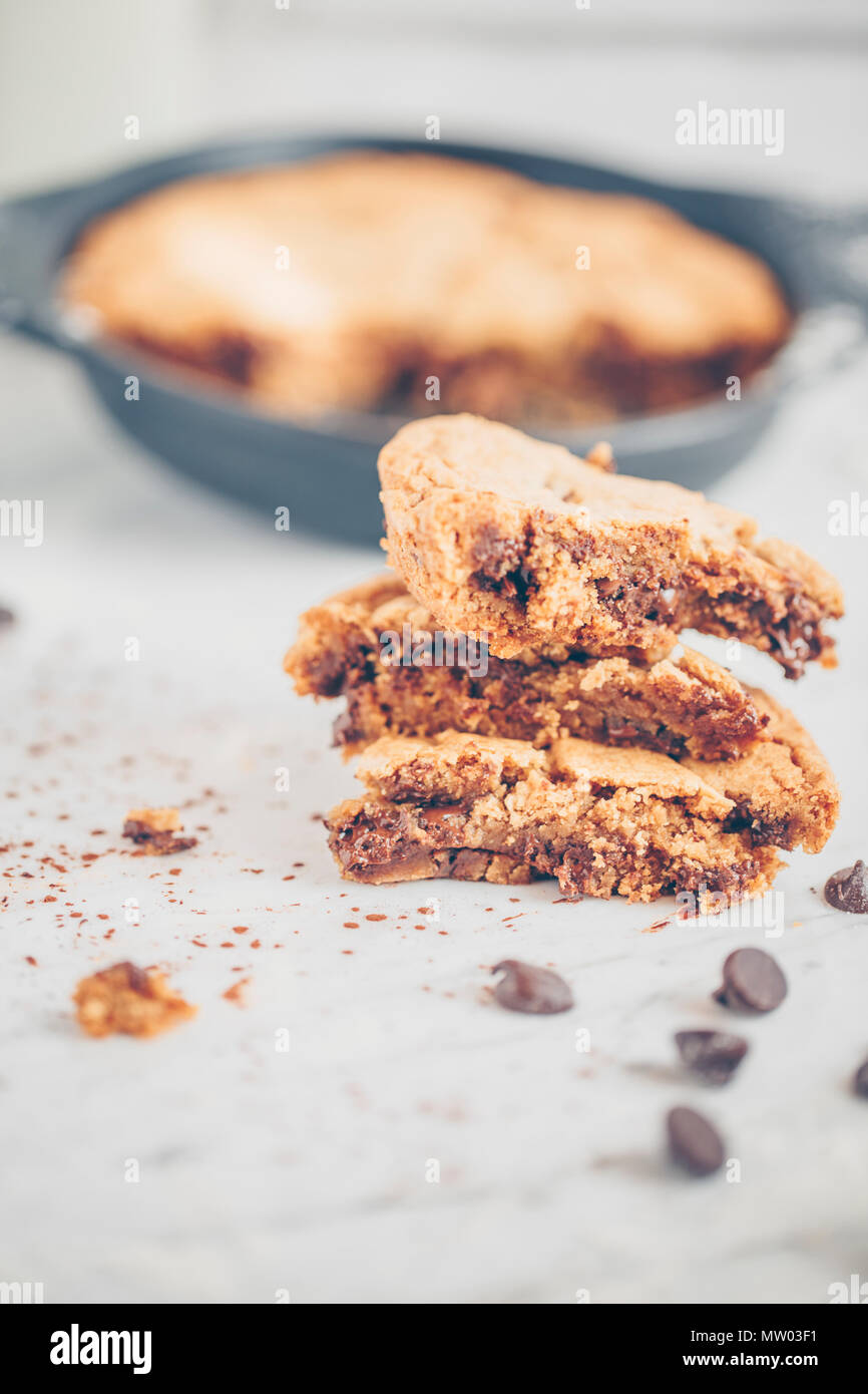 Giant chocolate chip cookie and stack of chocolate chip cookies Stock ...