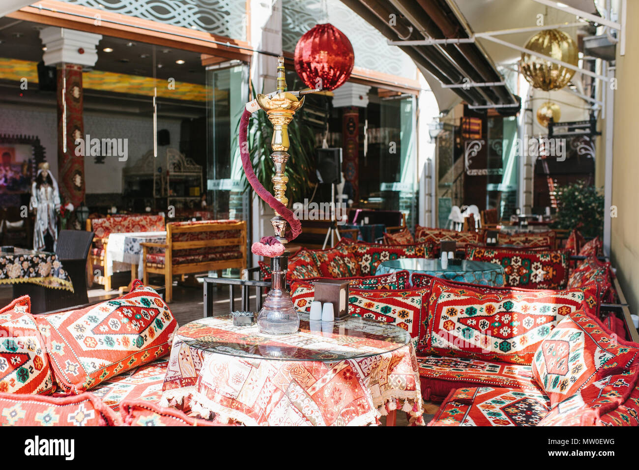 Empty Turkish cafe in the traditional style - bright textiles and ...