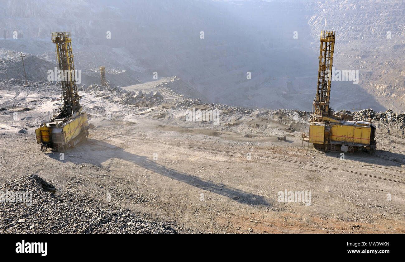 Chisel machine tools in career of iron ore Stock Photo - Alamy