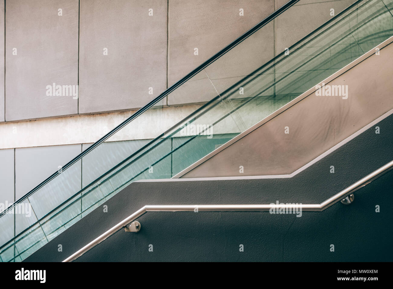 Closeup of escalator and handrail - geometric architecturall detail ...