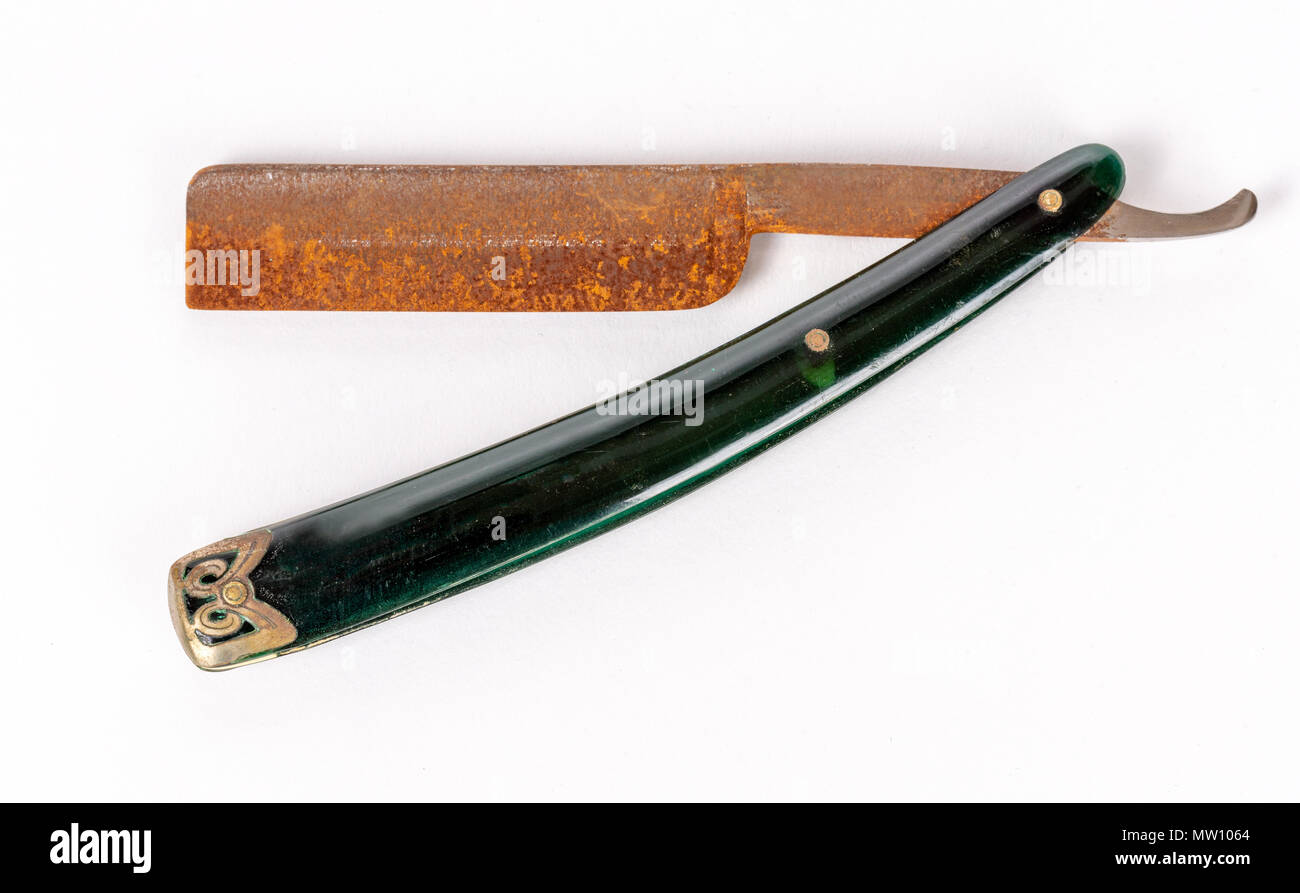 Vintage rusty old straight razor isolated on white background Stock ...