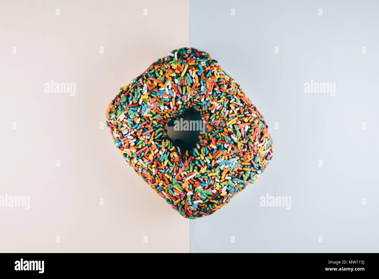 Square donut with colorful sprinkle. sweet food and dessert concept ...