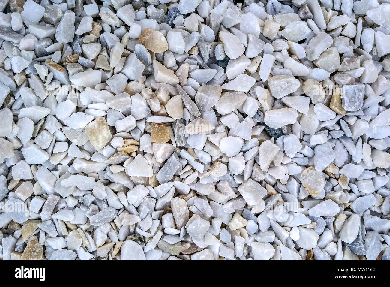 white stone rock pebbles texture background closeup Stock Photo - Alamy