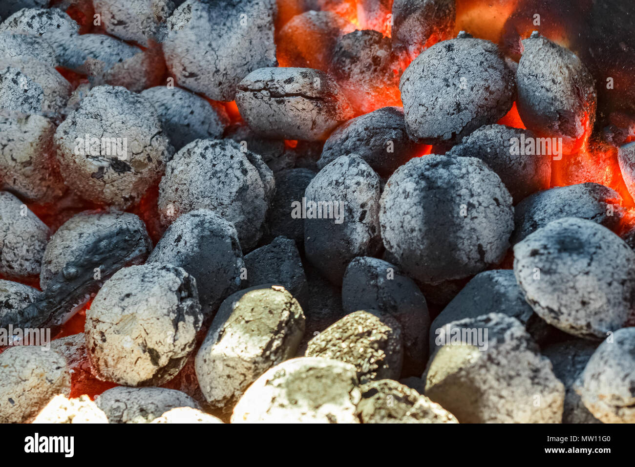 Hot flamed barbecue coal in a grill at summer party Stock Photo - Alamy