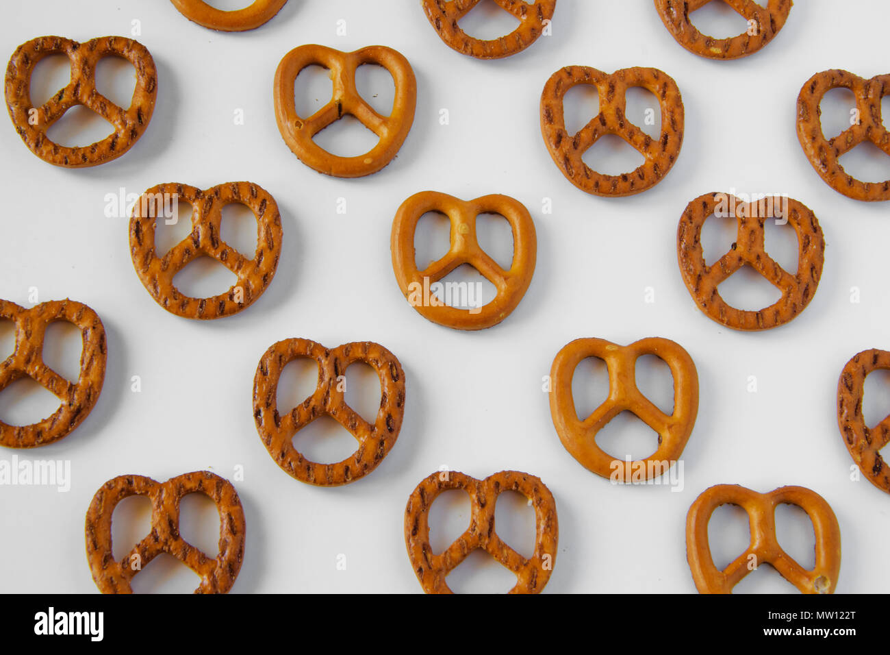 Food pattern- salty snacks/crisps on white background Stock Photo - Alamy