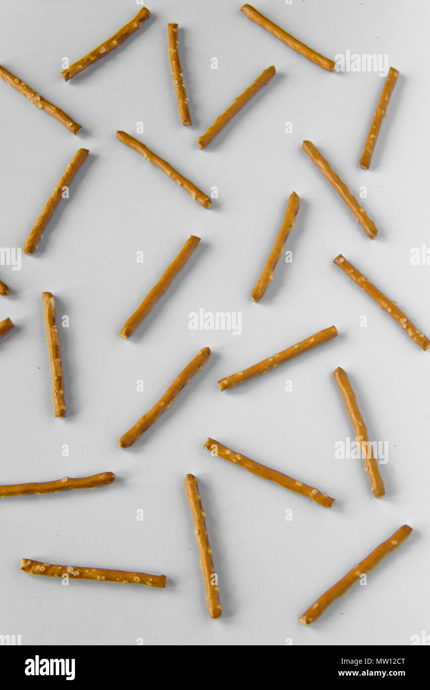 Food pattern- salty snacks/crisps on white background Stock Photo - Alamy