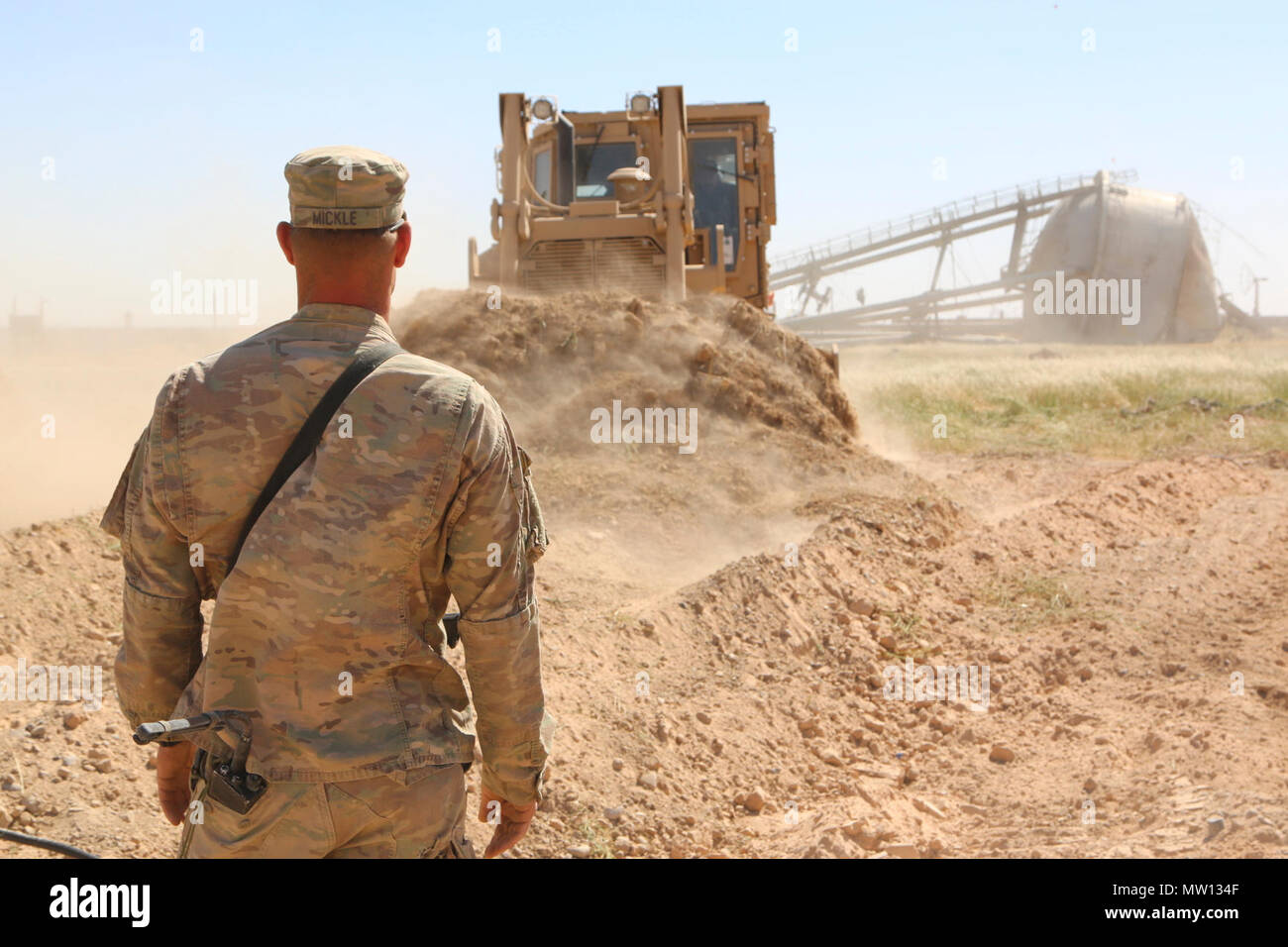 U.S. Army Sgt. Frederick Mickle, a horizontal construction engineer ...