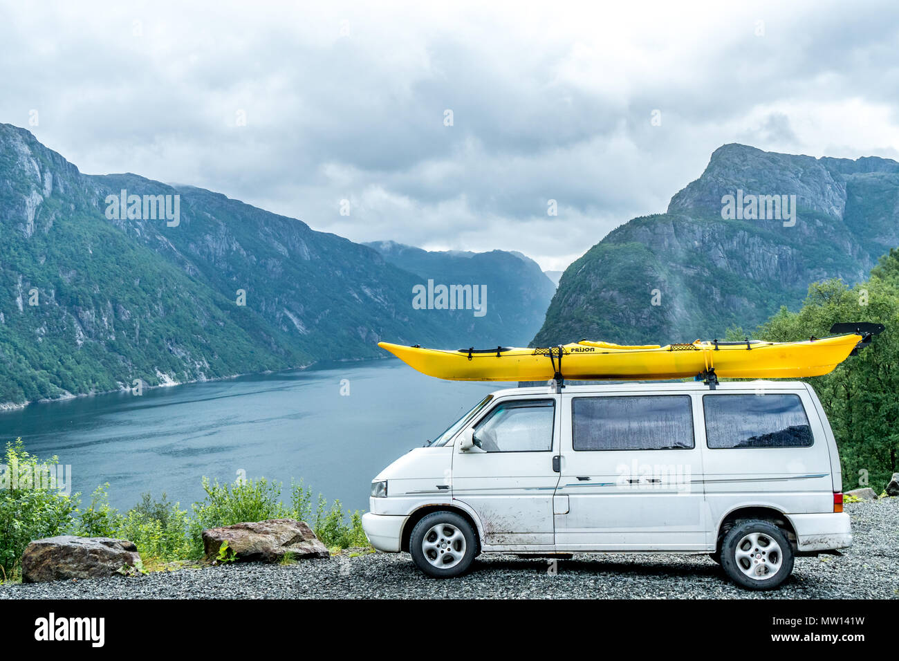 van with canoe standing infront of fjord Stock Photo - Alamy