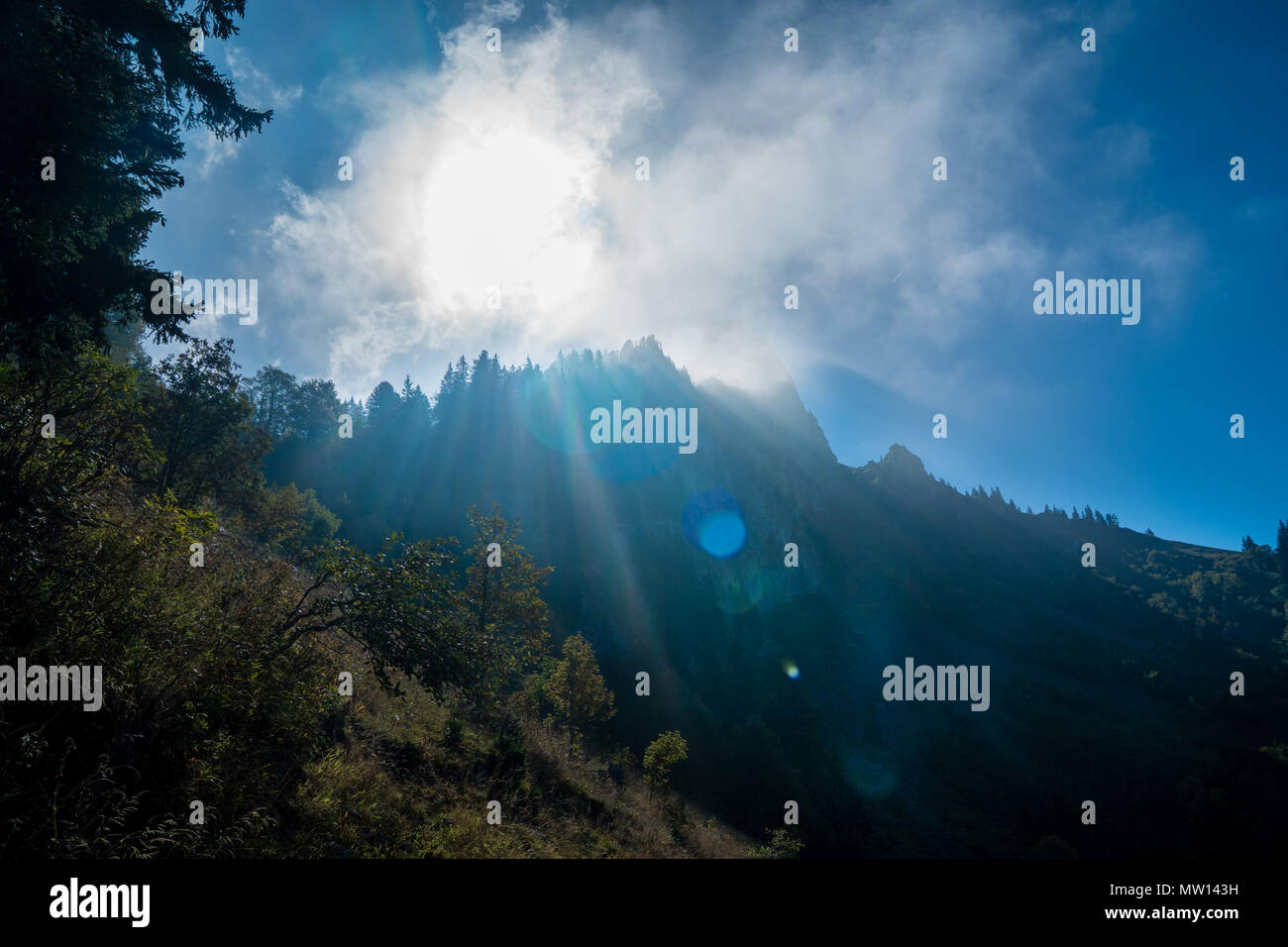 Sun shining through storm cloud hi-res stock photography and images - Alamy