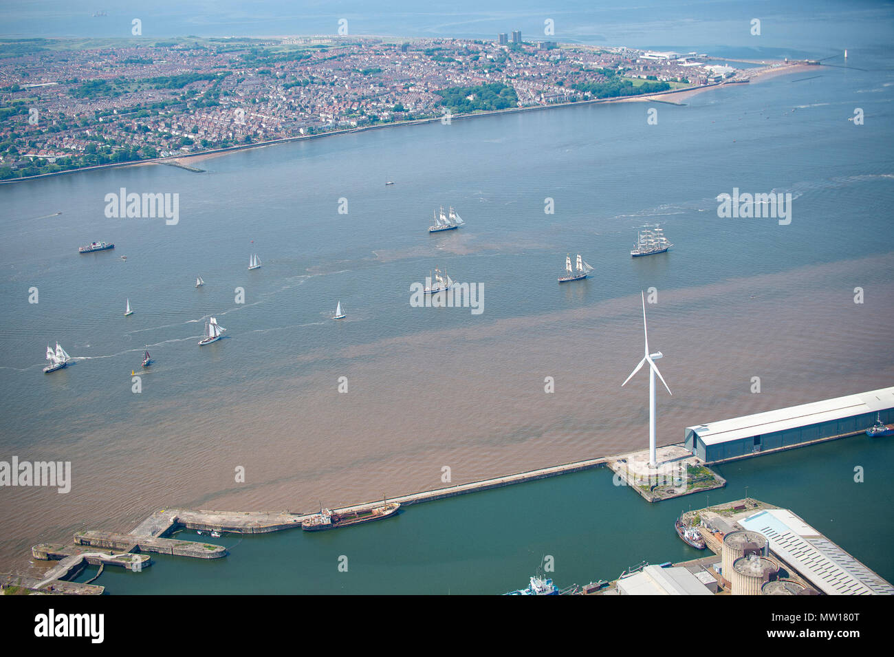 Aerial photo of tall ships leaving Liverpool on River Mersey Stock ...