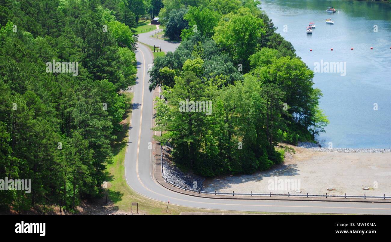 Scenic Aerial View Overlooking A Curvy Road And Beautiful Blue River ...