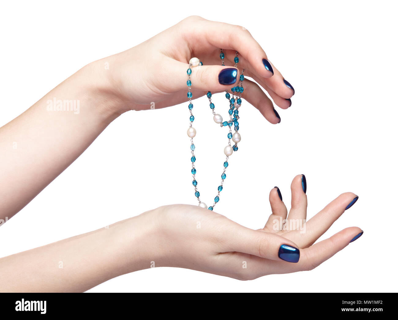 Woman with costume jewelery beads. Female fingers with shiny blue nails ...