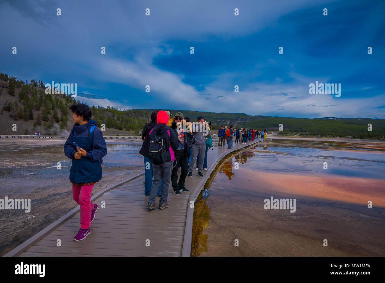 YELLOWSTONE, MONTANA, USA MAY 24, 2018: Crowd of tourists take pictures ...
