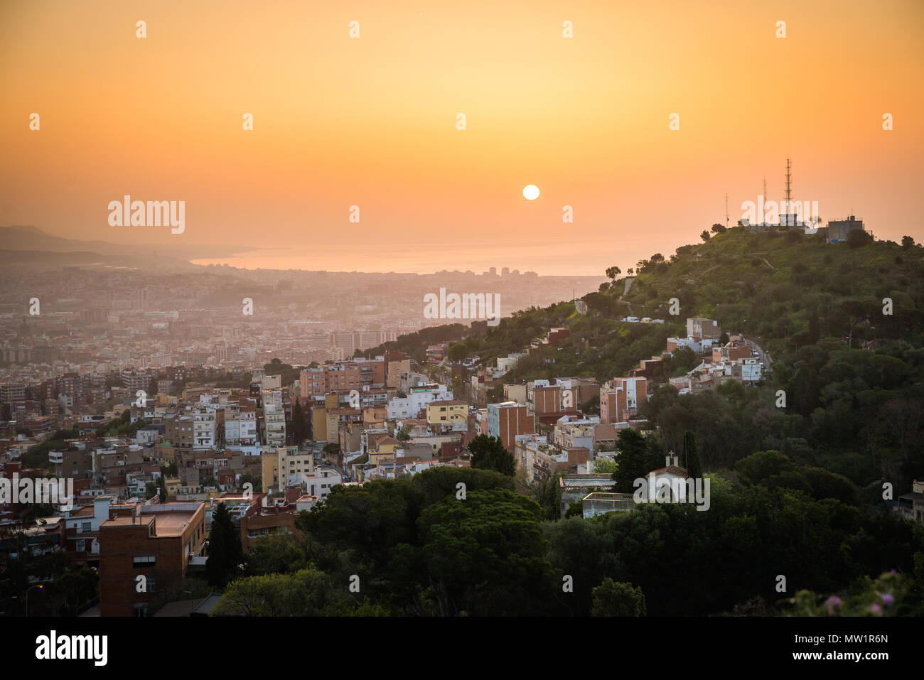 Beautiful morning in Barcelona on the top of a hill, surrounded by ...