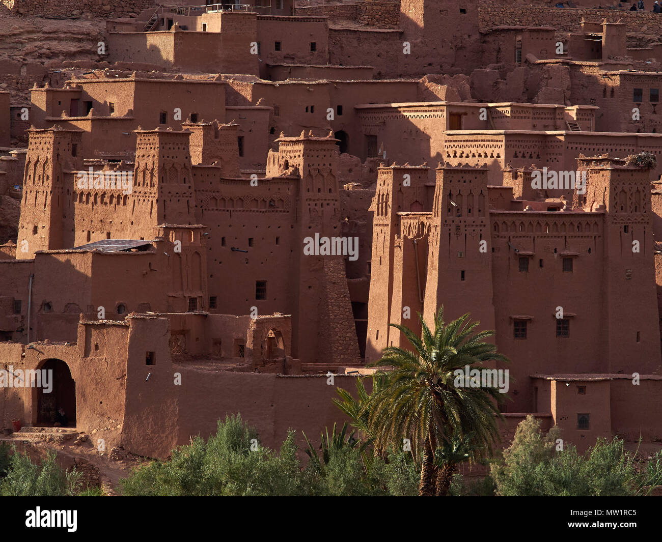 Pink walls of ancient fortresses of Tingir, partially illuminated by ...