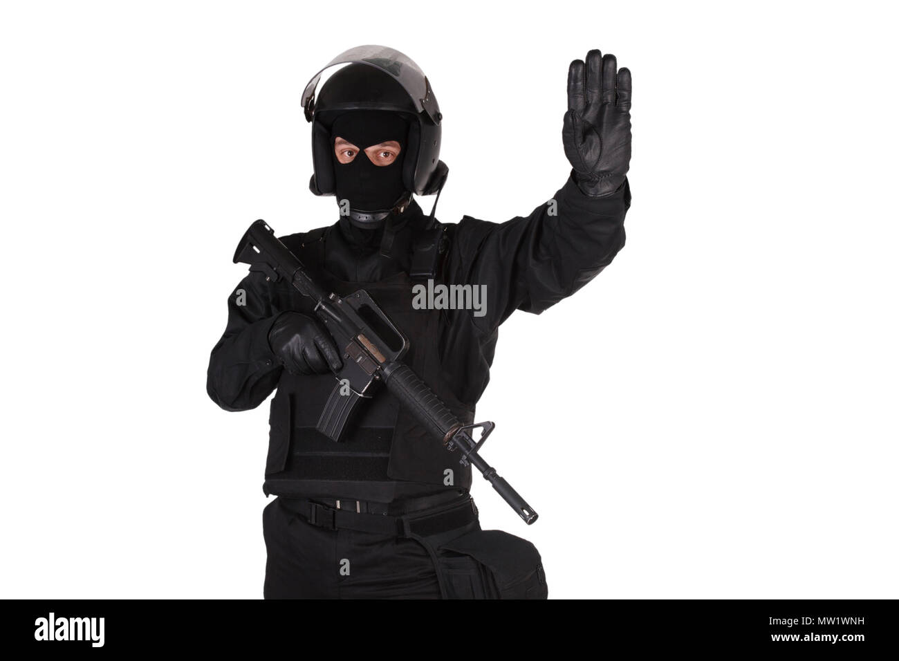 SWAT officer with assault rifle in black uniform isolated on white ...